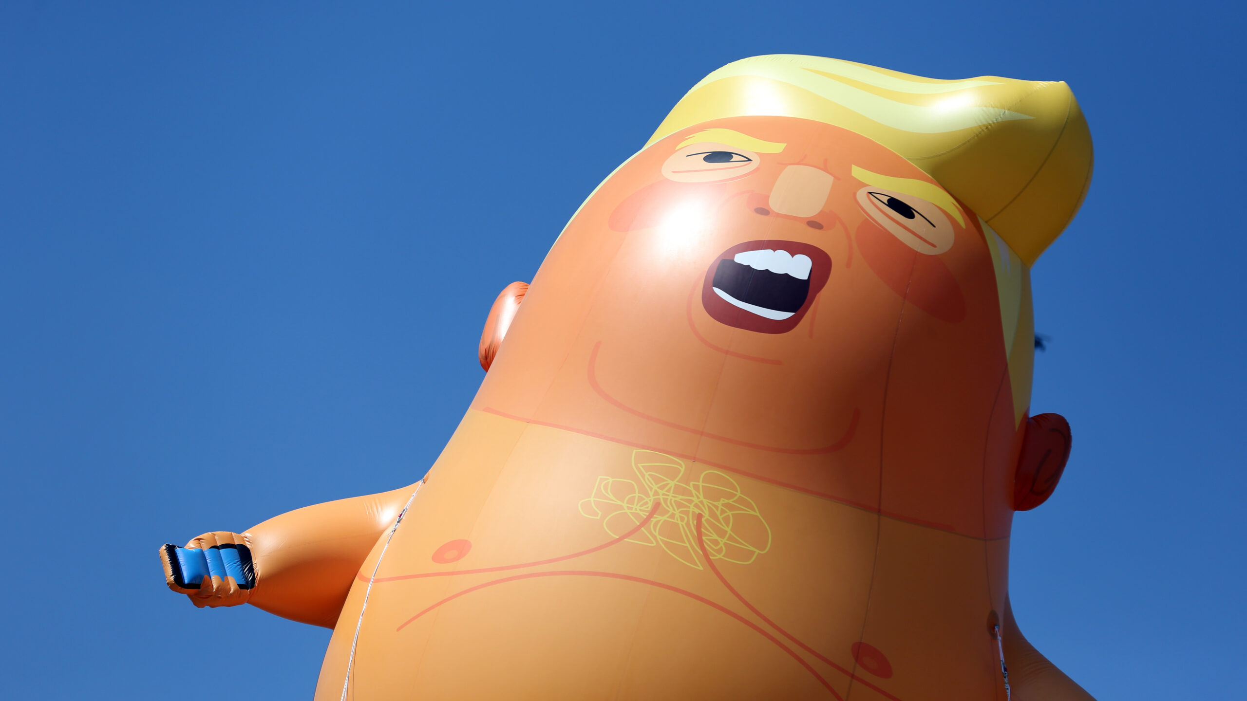 American Baby Trump Blimp Set To Breeze Onto Namesake’s Home Turf – WABE