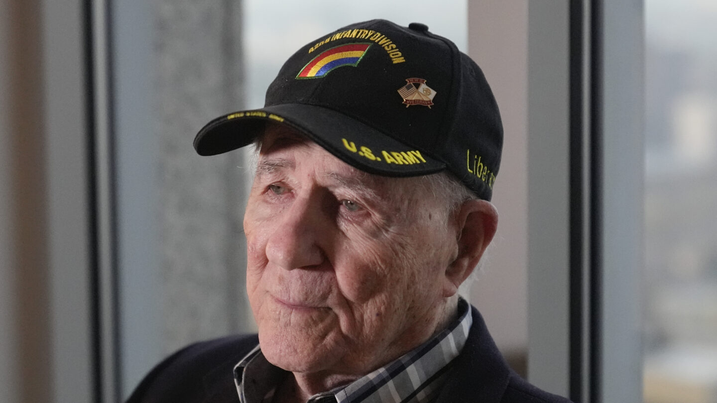 He saw the horrors of Dachau. Now, this veteran in Dunwoody warns ...